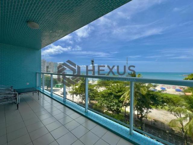 Apartamento frente mar com varanda na Praia das Pitangueiras, Guarujá