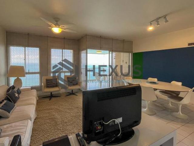 Apartamento frente mar com varanda nas Pitangueiras, Guarujá