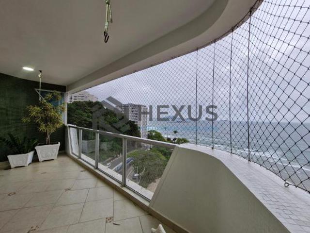 Apartamento frente mar com varanda e lazer na Praia das Asturias, Guaruja