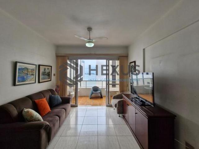 Apartamento frente mar com varanda e lazer na Praia das Asturias, Guaruja