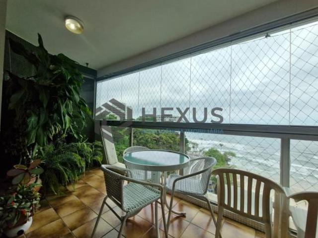 Apartamento frente mar com varanda e lazer na Praia das Asturias, Guaruja