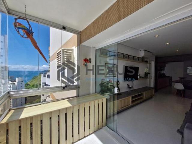 Apartamento frente mar com varanda e lazer na Praia das Asturias, Guaruja