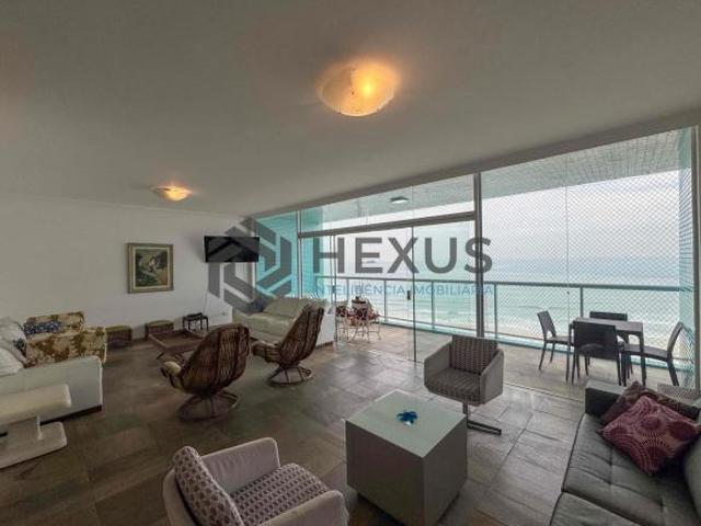 Apartamento frente mar com varanda e vista mar na Praia das Pitangueiras, Guaruj