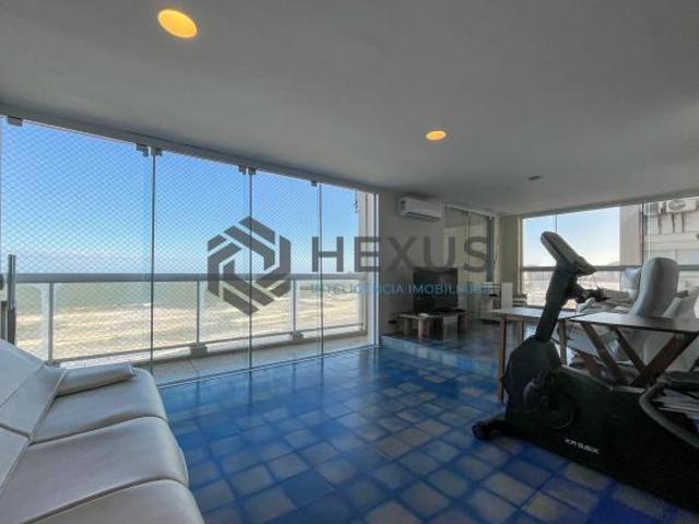 Apartamento frente mar com varanda vista mar na Praia das Pitangueiras, Guaruja