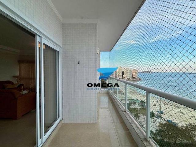 Apartamento frente mar reformado à venda na praia das Pitangueiras no Guarujá I Omega Imoveis