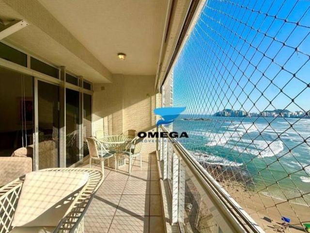 Apartamento frente mar reformado à venda na praia das Pitangueiras no Guarujá I Omega Imoveis