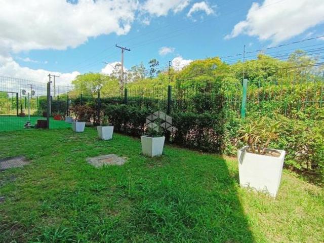 Apartamento Garden com 2 Dormitorios, sacada com churrasqueira, vaga dupla de garagem no Bairro Huma