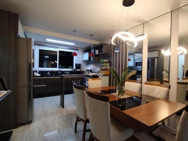 Apartamento localizado no bairro Monte Pasqual, com 107 m² com três dormitórios e uma suíte