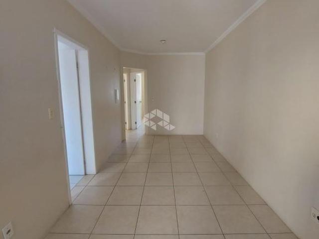 Apartamento localizado no centro com 2 dormitórios