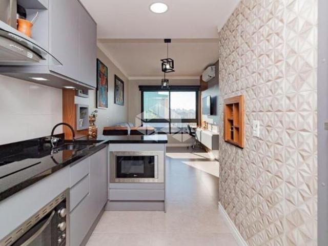Apartamento mobiliado 40,65m2 privativos, 1 dormitório, garagem coberta escriturada, infra completa