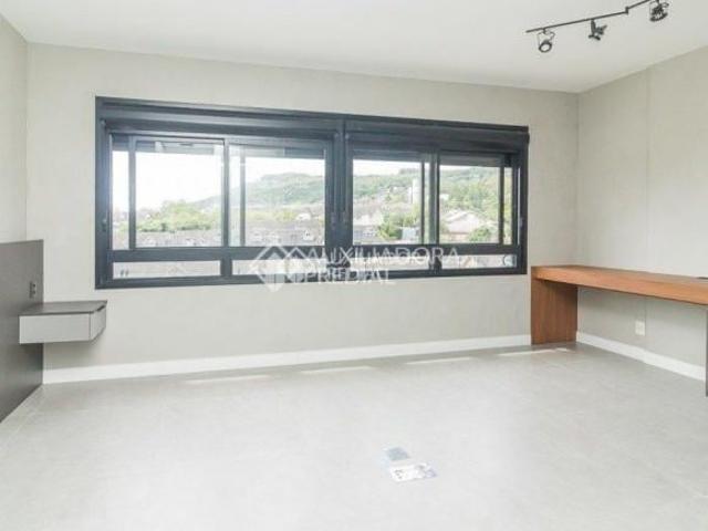 Apartamento mobiliado com garagem no bairro Jardim Botânico