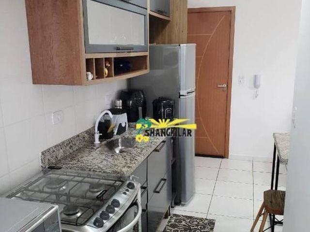Apartamento mobiliado com sacada 2 dormitórios à venda, 46 m² por R$ 360.000 Aviação Praia Gra
