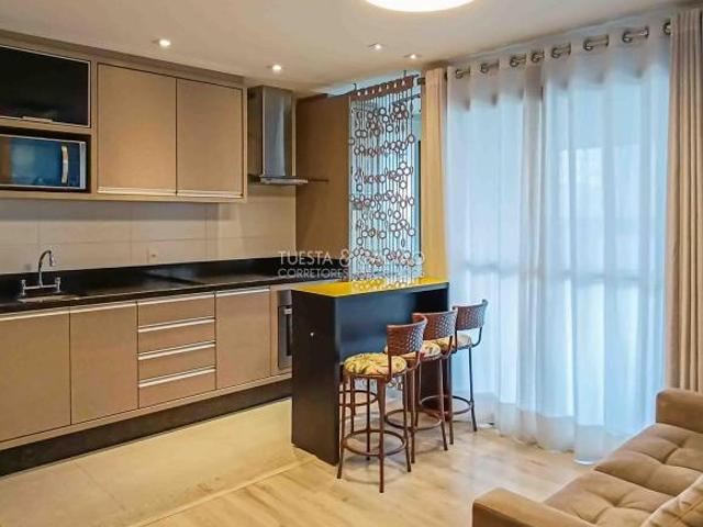 Apartamento mobiliado com sacada e churrasqueira
