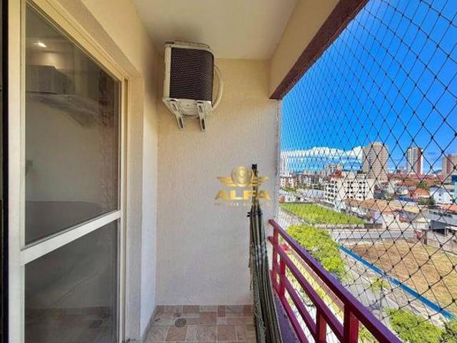 Apartamento mobiliado com sacada e 2 vagas na Praia da Enseada – Alfa Imóveis Guarujá