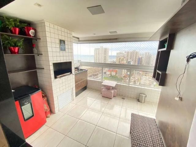 Apartamento mobiliado com vista para o mar à venda no bairro Guilhermina em Praia Grande/SP