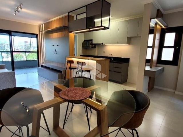 Apartamento mobiliado com 02 dormitórios 01 suíte no Centro
