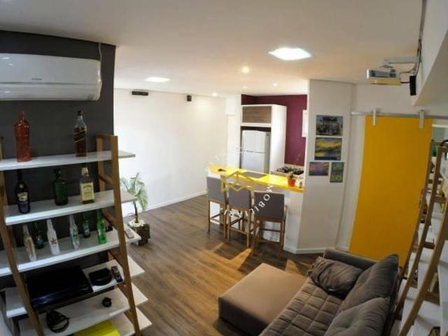 APARTAMENTO MOBILIADO COM 1 DORMITÓRIO DE 45 M² EM ANDAR ALTO E TOTALMENTE REPAGINADO À VENDA