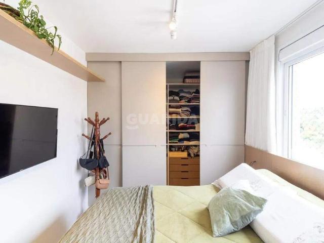 Apartamento mobiliado com 2 dormitórios e 2 vagas no bairro Menino Deus COD: 25759