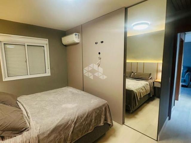Apartamento mobiliado com 2 quartos e 1 vaga no bairro Santa Rita em Guaíba RS