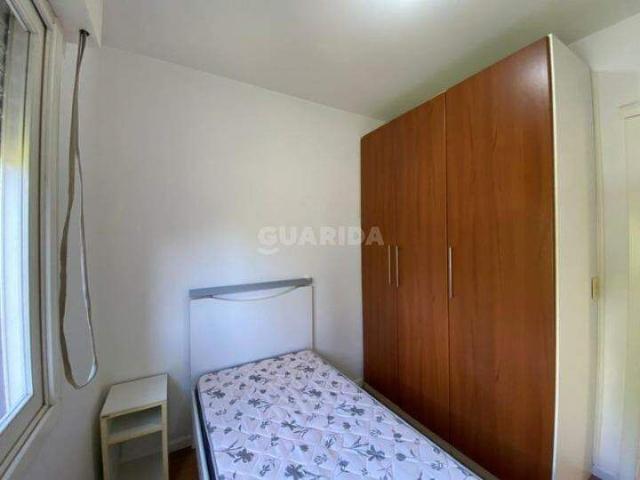 Apartamento mobiliado com 3 dormitórios e 1 vaga de garagem no bairro Chácara das Pedras COD: 23435