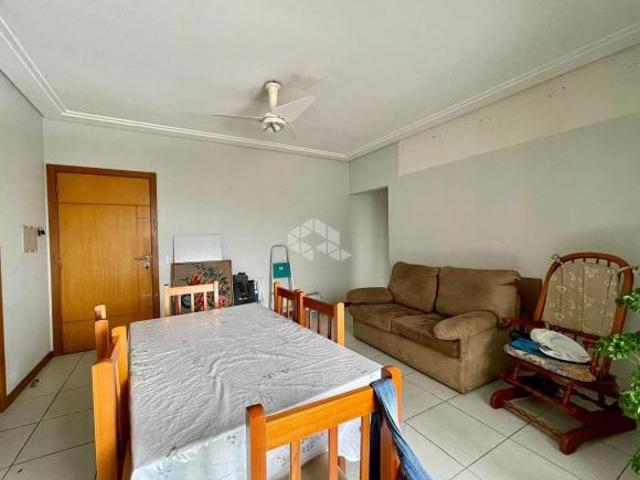 Apartamento mobiliado composto por 2 dormitórios, no centro de Capão da Canoa/RS