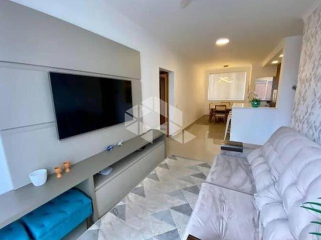 Apartamento mobiliado à venda no Centro de Capão da Canoa com 2 dormitórios 1 suíte