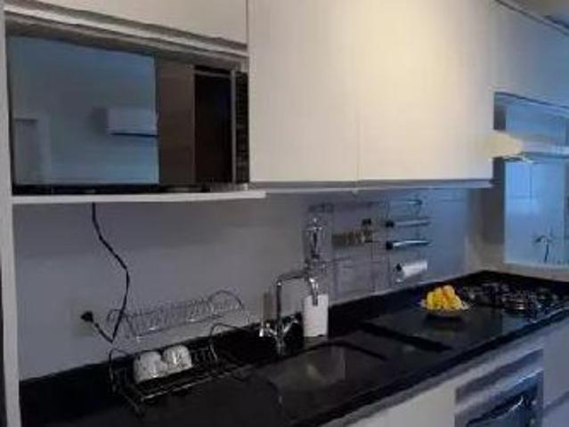 Apartamento mobiliado de 2 dormitórios com suíte