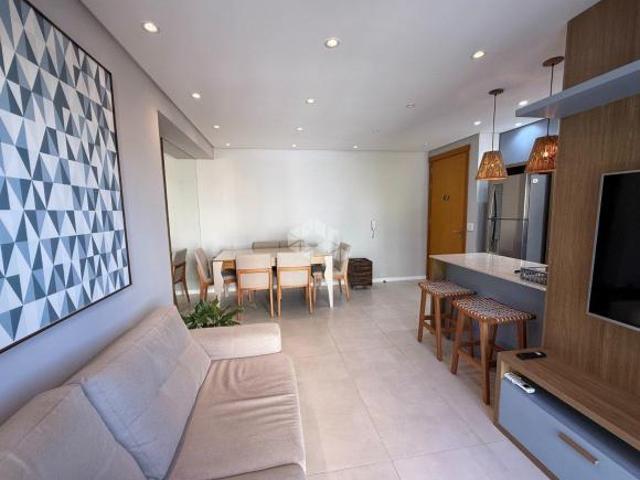 Apartamento mobiliado de 2 dormitórios com suíte e 1 vaga à venda no bairro Bela Vista