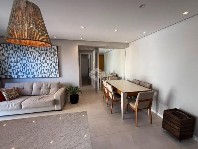Apartamento mobiliado de 2 dormitórios com suíte e 1 vaga à venda no bairro Bela Vista