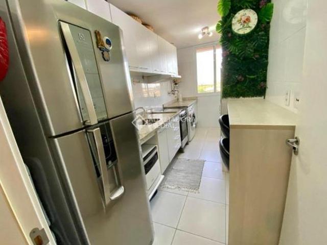 Apartamento mobiliado de 2 quartos com suite, 2 vagas de garagem, sacada com churrasqueira