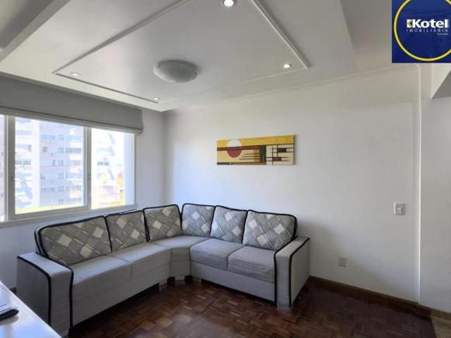 Apartamento mobiliado de 71m², com 2 dormitórios, sendo 1 suíte e vaga no Centro