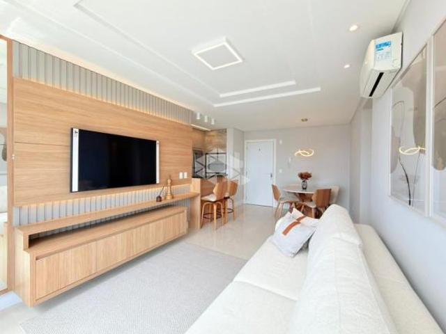 Apartamento mobiliado e decorado composto por 2 quartos sendo 1 suíte, no Centro de Capão da Canoa/