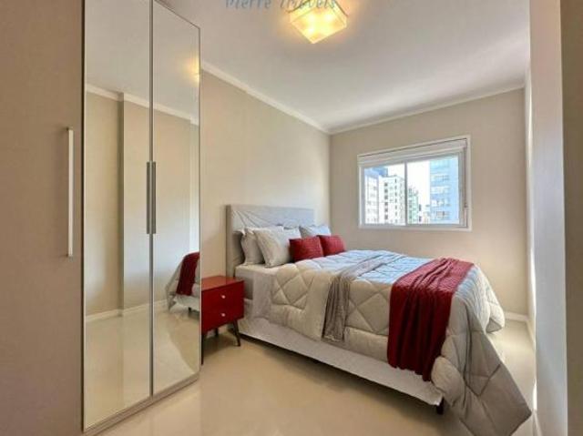 APARTAMENTO MOBILIADO PRÓXIMO DA PRAIA COM 2 VAGAS