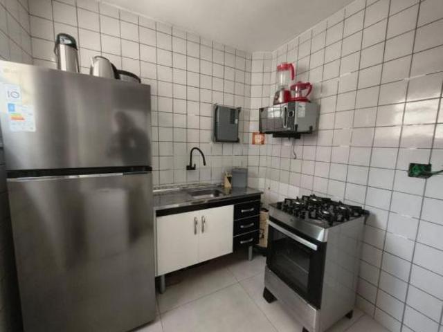 Apartamento mobiliado reformado com garagem à venda, 32 m² por R$ Canto do Forte Praia Grande/SP