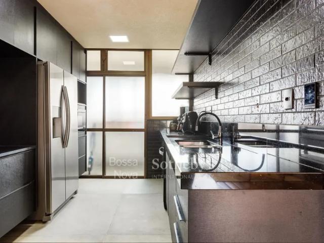 Apartamento moderno com espaço gourmet e piscina de borda infinita
