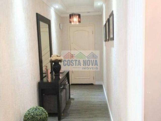 Apartamento na Guilhermina com 3 dormitórios e 2 vagas de garagem a 2 quadras da praia