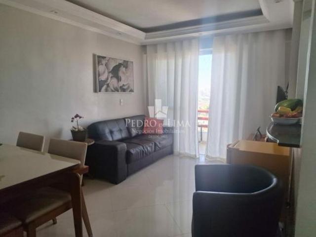 Apartamento na Penha, andar alto, vista livre com 2 quartos sendo 1 suíte, sala com sacada, 1 vaga