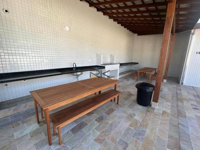 APARTAMENTO NAS TONINHAS COM 2 DORMITÓRIOS SENDO 1 SUÍTE,SALA 2 AMBIENTES,VARANDA GOURMET COM CHURRA