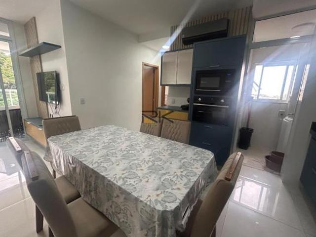 APARTAMENTO NAS TONINHAS COM 2 DORMITÓRIOS SENDO 1 SUÍTE,SALA 2 AMBIENTES,VARANDA GOURMET COM CHURRA