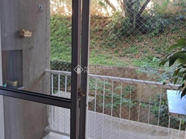 Apartamento no 2° andar de 02 dormitórios de frente para a reserva