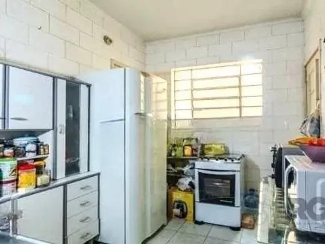 Apartamento no bairro Auxiliadora de 3 dormitórios