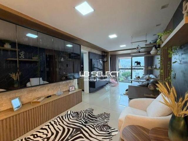 Apartamento no bairro Santa Mônica com três suítes e varanda gourmet