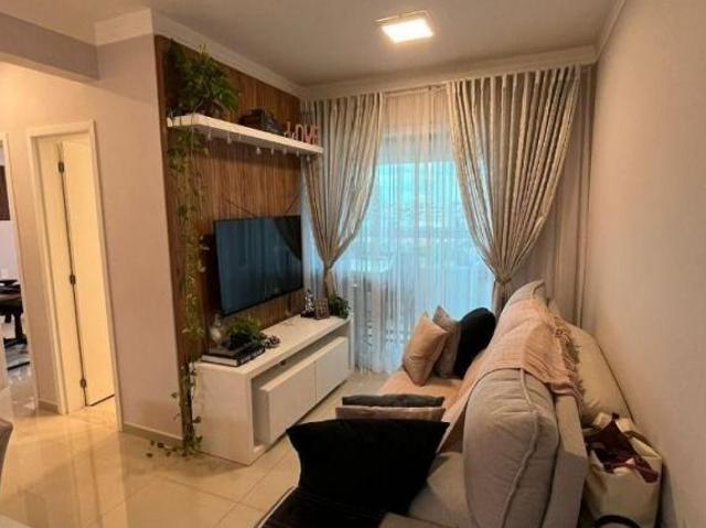 Apartamento no bairro Santa Mônica com dois quartos, suíte e varanda gourmet