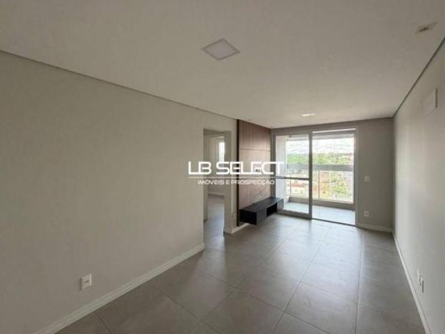 Apartamento no bairro Santa Mônica com dois quartos, suíte e varanda gourmet