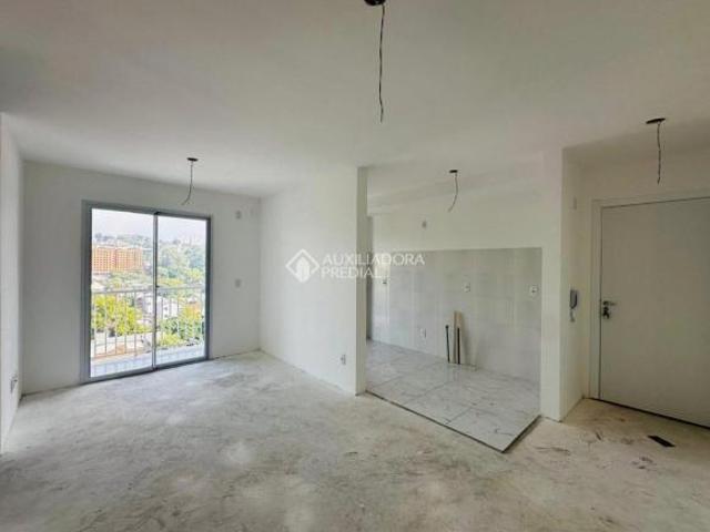 Apartamento no bairro Rondônia em Novo Hamburgo com 2 dormitórios sacada com churrasqueira