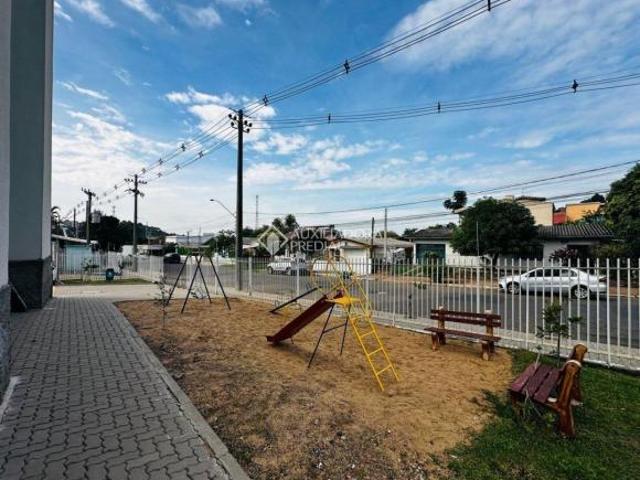Apartamento no bairro Rondônia em Novo Hamburgo com 2 dormitórios sacada com churrasqueira