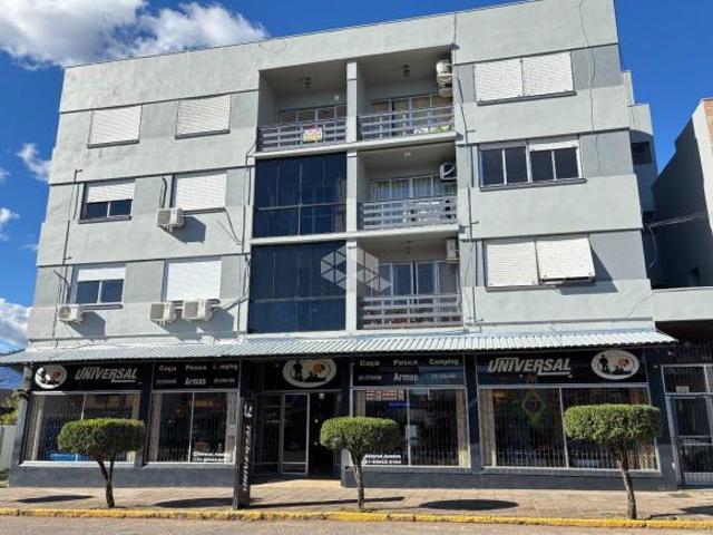 APARTAMENTO NO CENTRO COM 02 DORMITÓRIOS