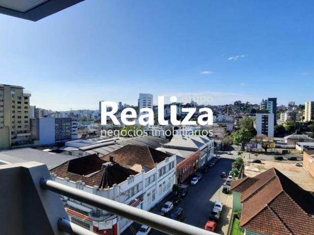 Apartamento no Centro de Caxias, com 2 dormitórios, salas de estar e jantar com sacada, cozinha, áre
