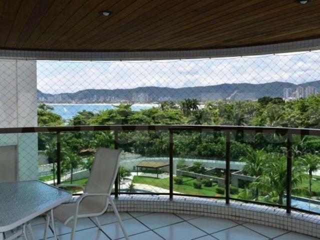 Apartamento no condomínio Tortugas na praia da Enseada