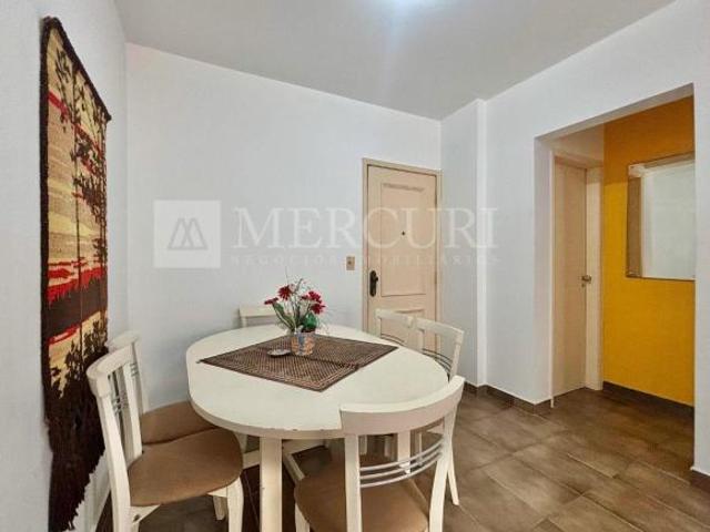 Apartamento no Guarujá, Enseada, Sala para 2 Ambientes Mercuri Imóveis Imobiliária no Guarujá